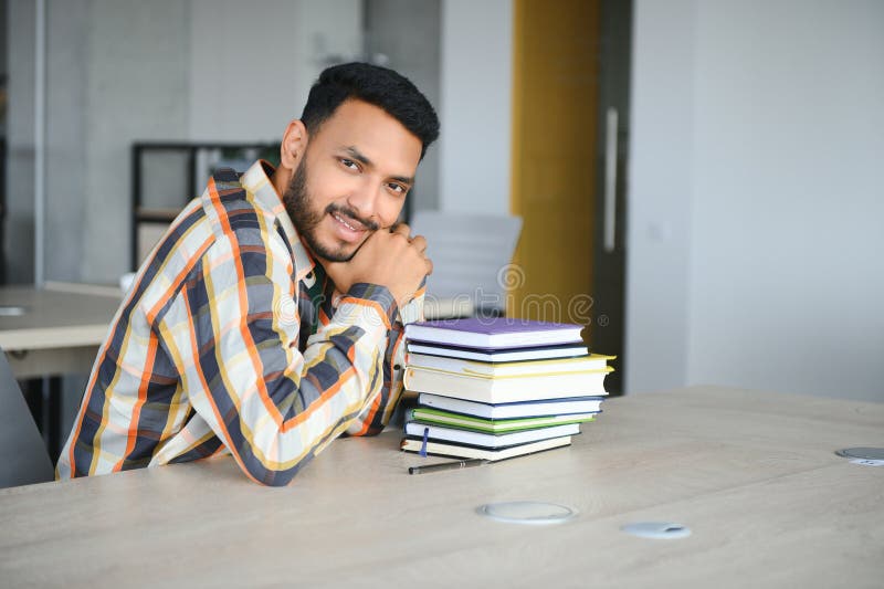 Handsome and Young Indian Male College Student. Stock Image - Image of ... Handsome and Young Indian Male College Student. Stock Image - Image of ...