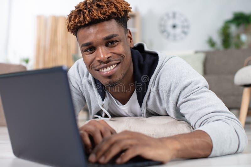 Handsome Young Man Browsing Internet Smiling Stock Image - Image of ...