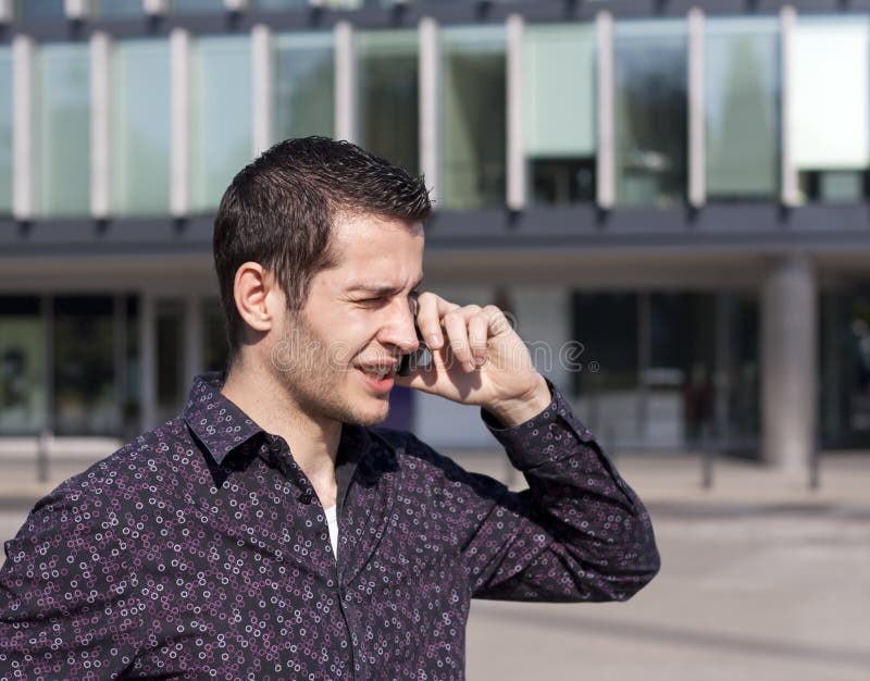 Handsome young man calling stock photo. Image of caucasian - 21420950