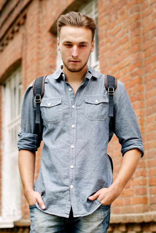 Handsome Young Man Carrying a Backpack Stock Image - Image of shoulder ...