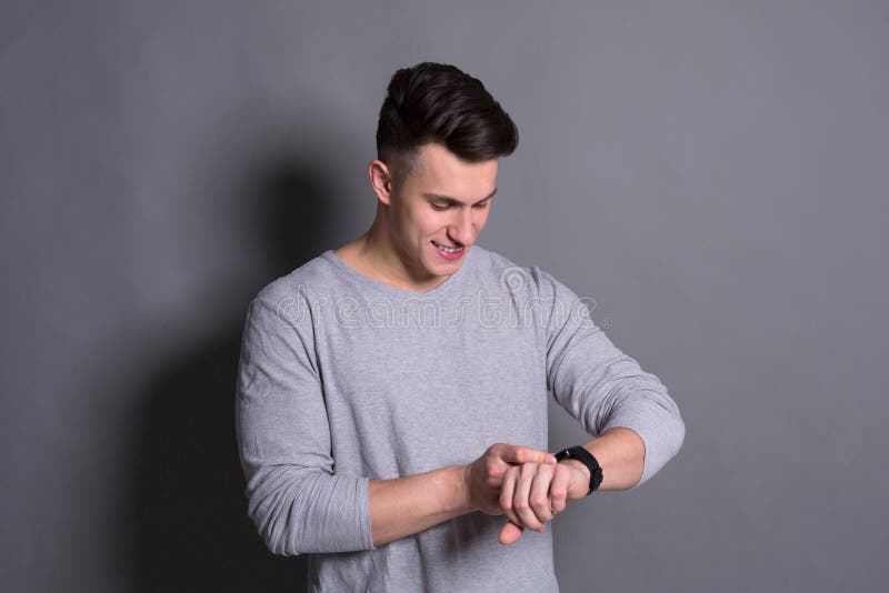 Handsome Young Man Checking Hand Watch Time Stock Image - Image of ...