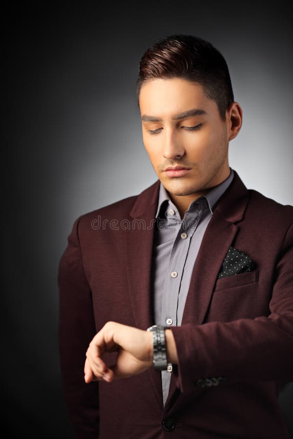Handsome Man Checking the Time on His Wrist Watch Stock Image - Image ...