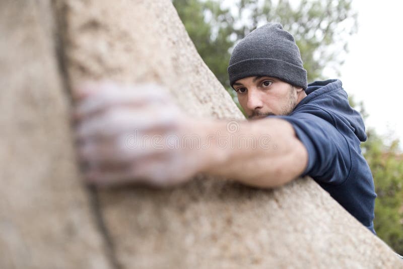 Handsome Young Man Climbing Natural Rocky Wall. Stock Image - Image of ...