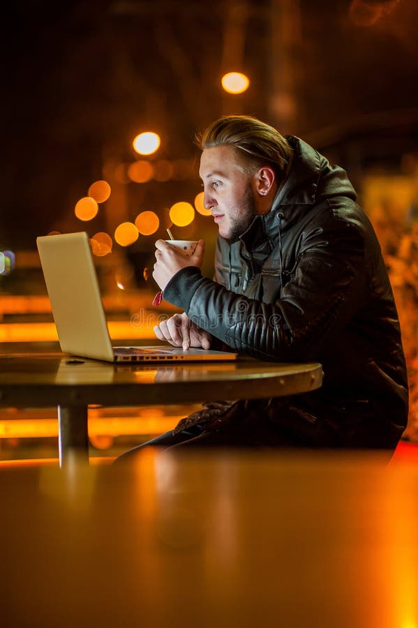 Handsome Young Man with a Computer on the Street Stock Image - Image of ...