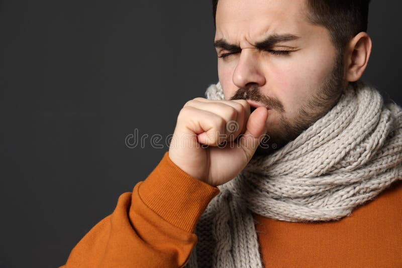 Handsome Young Man Coughing Against Dark Background Stock Photo - Image ...
