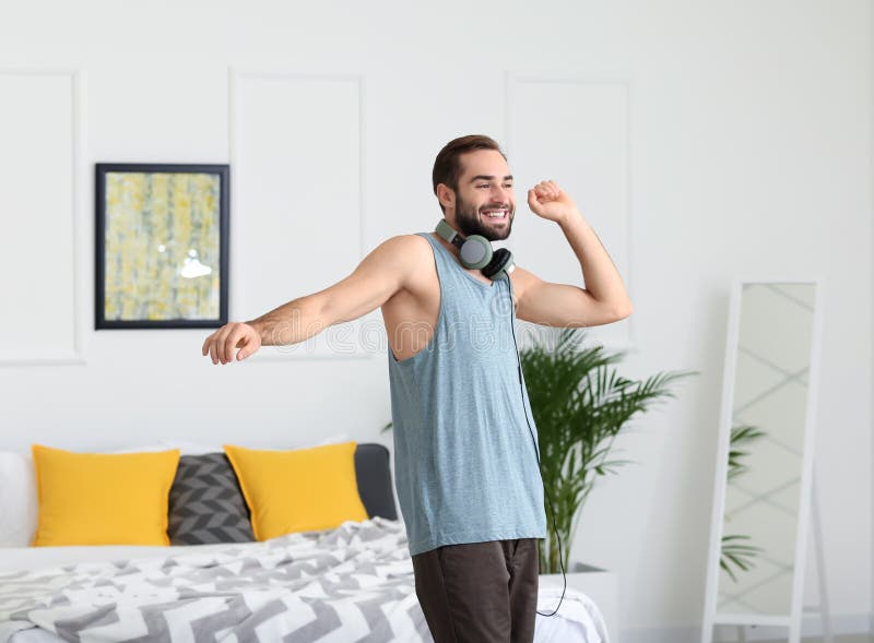 Handsome Young Man Dancing at Home Stock Photo - Image of action ...