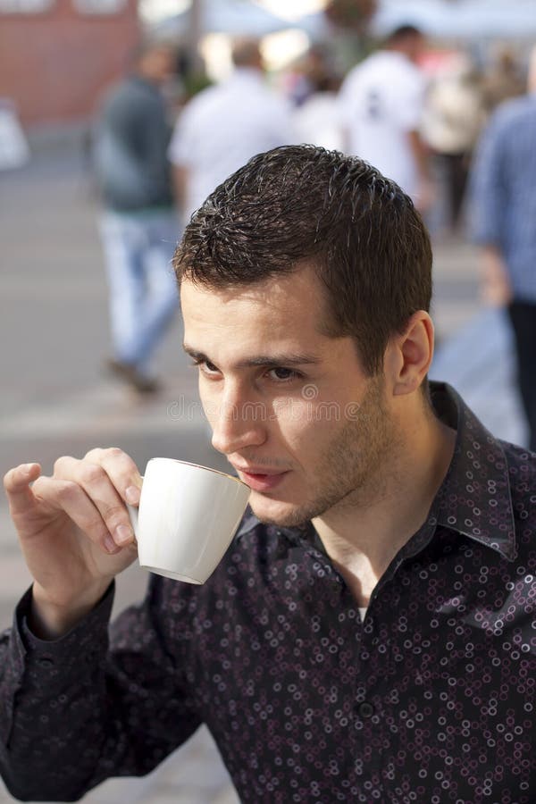Handsome Young Man Drinking Coffee Stock Image - Image of crowd ...