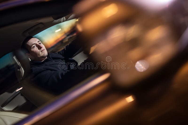 Handsome Young Man Driving His Car at Night Stock Photo - Image of ...