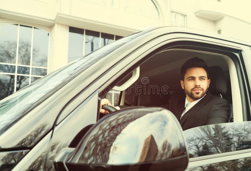 Handsome Young Man Driving His Car Stock Photo - Image of professional ...