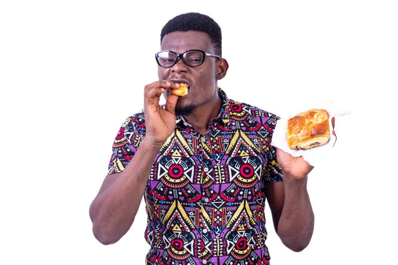 Handsome Young Man Eating Croissant Stock Photo - Image of adult ...