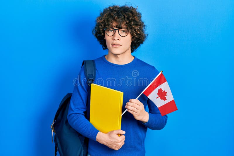 Handsome Young Man Exchange Student Holding Canada Flag Clueless and ...