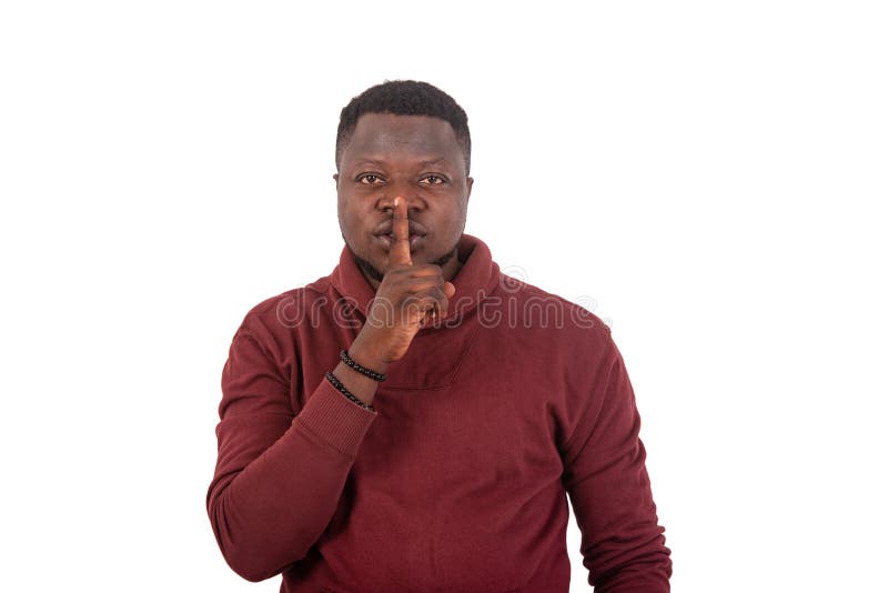 Handsome Young Man with Fingers on Lips Stock Image - Image of isolated ...