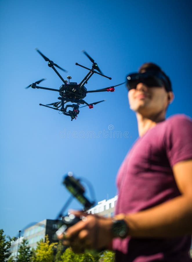 Handsome Young Man Flying a Drone Outdoors Stock Image - Image of pilot ...