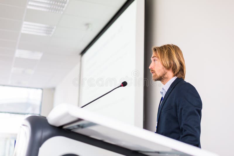 Handsome Young Man at a Conference Stock Photo - Image of conference ...