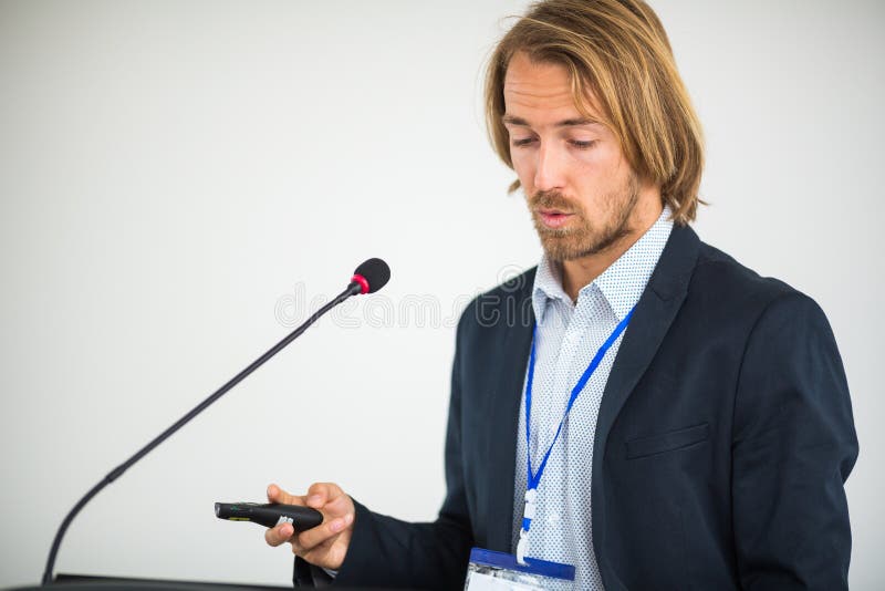 Handsome Young Man Giving a Speech Stock Photo - Image of briefing ... Handsome Young Man Giving a Speech Stock Photo - Image of briefing ...