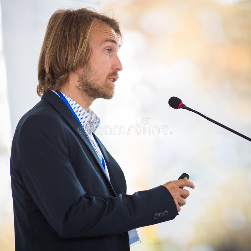 Handsome Young Man Giving a Speech Stock Photo - Image of coaching ...