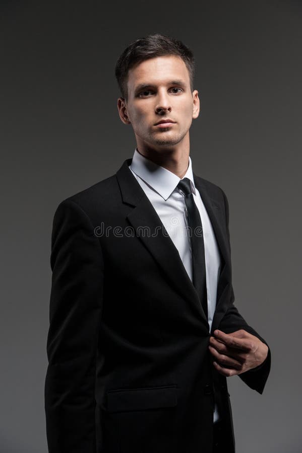 Handsome Young Man on Grey Background. Stock Image - Image of lawyer ...