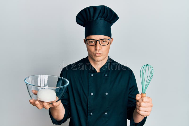 Handsome Young Man Holding Bread Dough and Blender Depressed and Worry ...