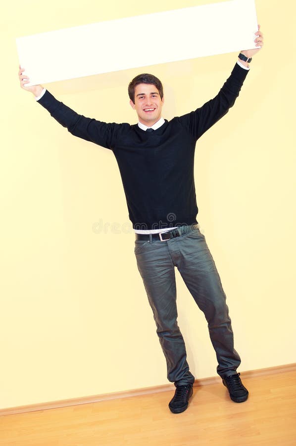 Crouching Handsome Young Man In Winter Stock Photo - Image of evening ...