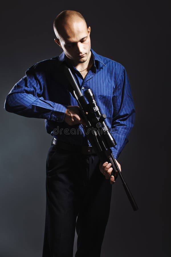 Handsome Young Man Holding a Gun. Stock Image - Image of mafia, male ...