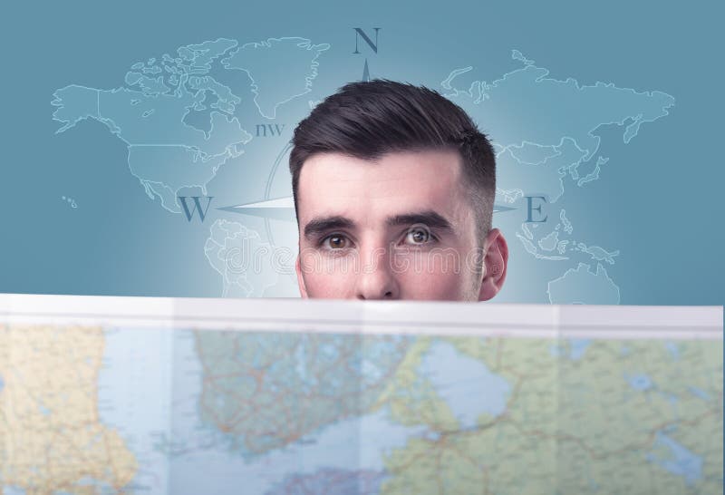 Young man holding map stock photo. Image of country - 105861906