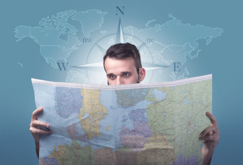 Young man holding map stock photo. Image of person, excursion - 108500268