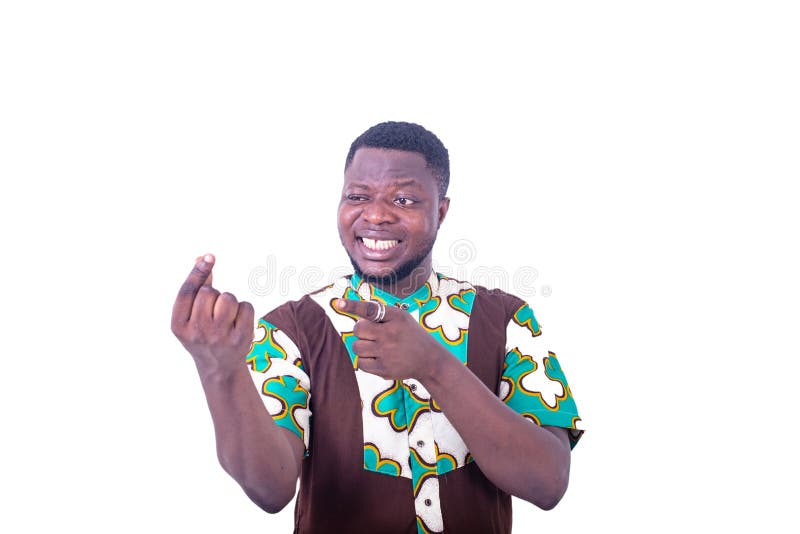 Handsome Young Man Holding Something Invisible and Pointing Fing Stock ...