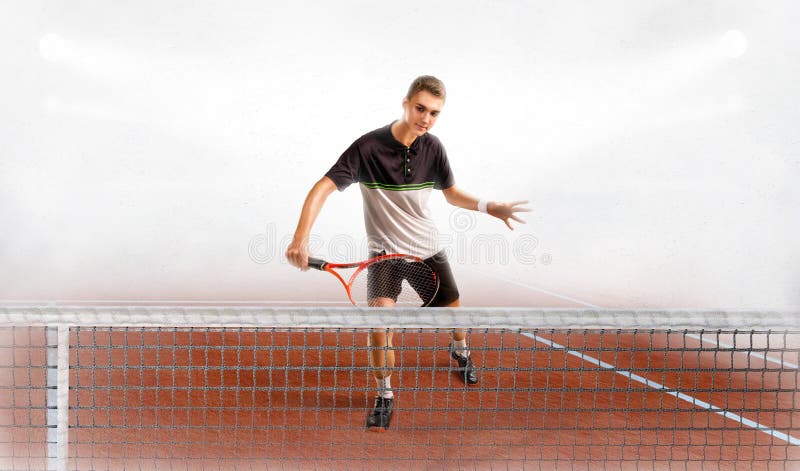 Handsome Young Man Holding Tennis Racket and Looking Away while Stock ...
