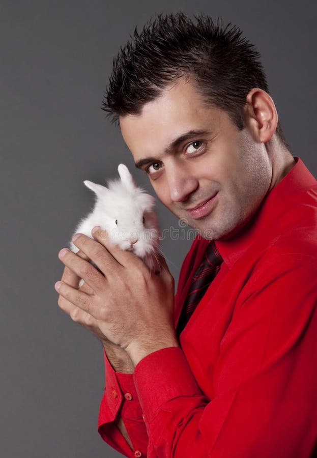 Handsome Young Man Holding White Rabbit Stock Image - Image of cute ...