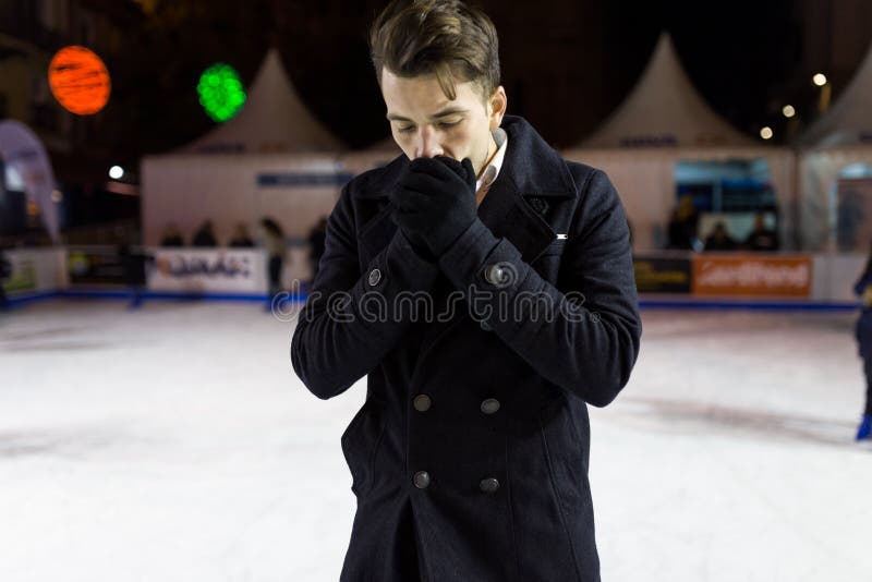 Handsome Young Man Ice Skating on Rink Outdoors. Stock Image - Image of ...