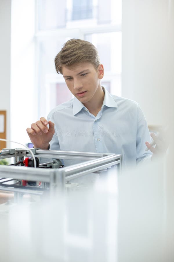 Engineer Inspecting 3d Printer Stock Photos - Free & Royalty-Free Stock ...
