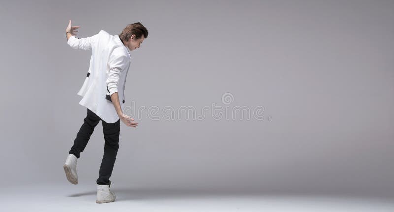 Handsome Boy with Jacket Dancing Alone Stock Photo - Image of adult ...