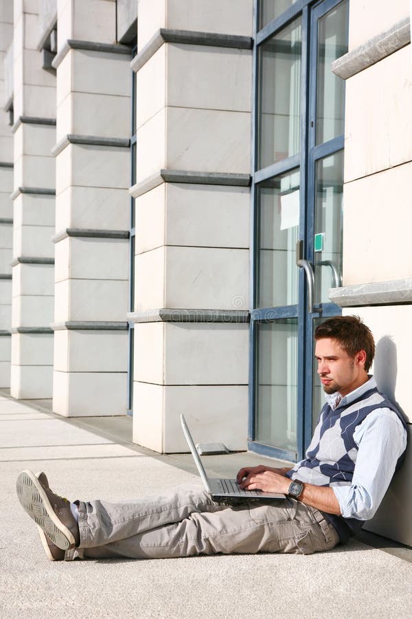 Man Relaxing on Sofa and Work on Laptop Computer Stock Photo - Image of ...