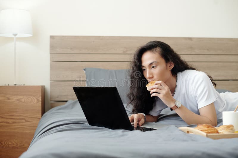 Man Watching Tutorial on Laptop Stock Image - Image of laptop, food ...