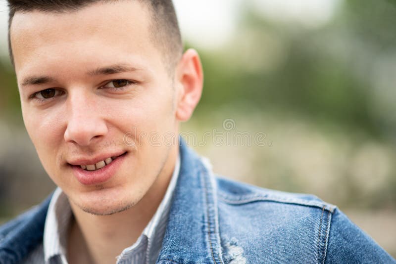 Handsome Young Man Looking at the Camera Stock Photo - Image of water ...