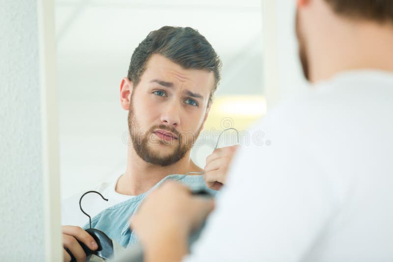 Handsome Young Man Looking at Himself in Mirror Stock Photo - Image of ... Handsome Young Man Looking at Himself in Mirror Stock Photo - Image of ...