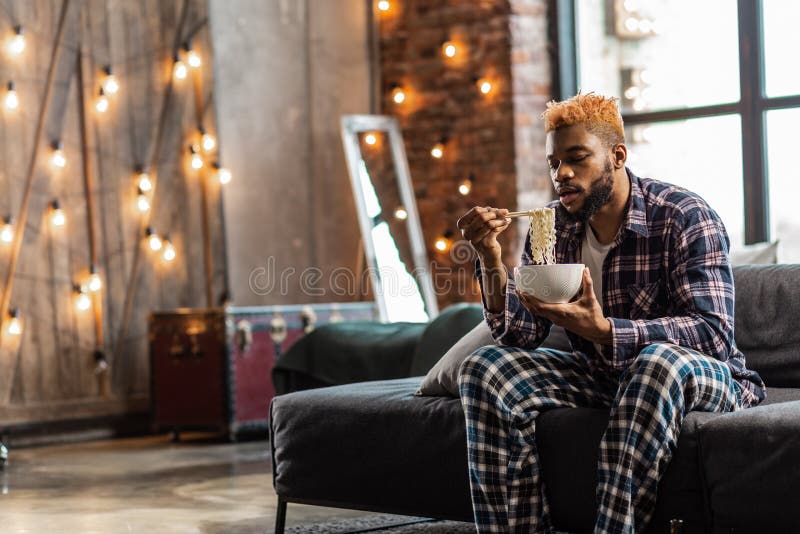 Handsome Young Man Looking at His Food Stock Image - Image of ...