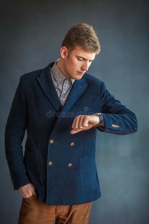 Handsome Young Man Looking at His Watch Stock Photo - Image of assured ...