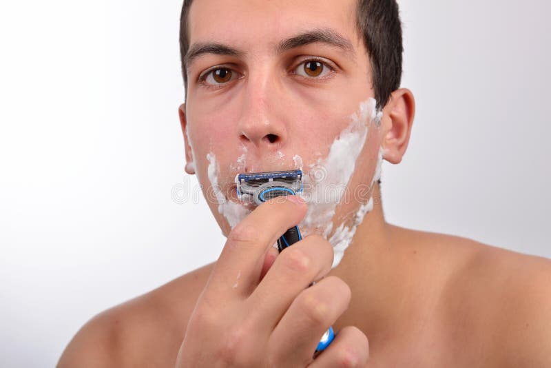 Handsome Young Man with Lots of Shaving Cream on His Face is Sha Stock ...
