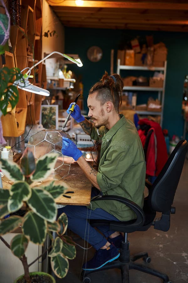 Handsome Young Man Making Glass Terrarium in Workshop Stock Image ...
