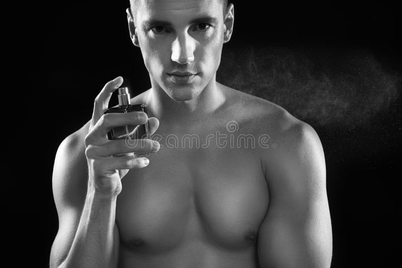 Black Man Spraying Cologne Stock Photos - Free & Royalty-Free Stock ...