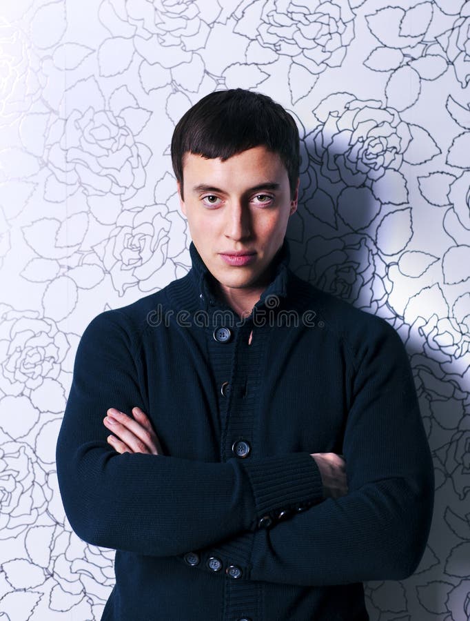 Handsome Young Man Posing on the Flower Background Stock Image - Image ...
