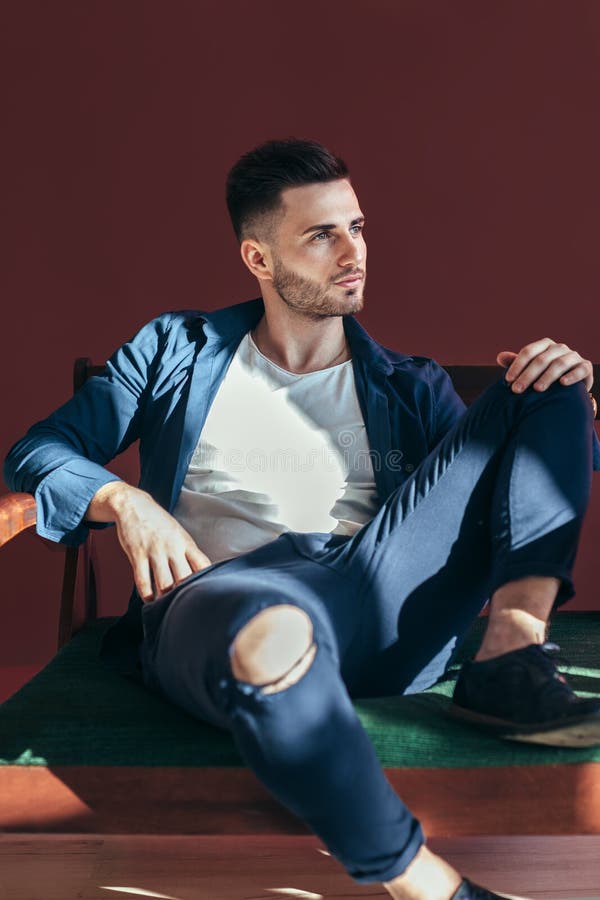 Handsome Young Man Posing in Relax Pose in Studio Stock Photo - Image ...