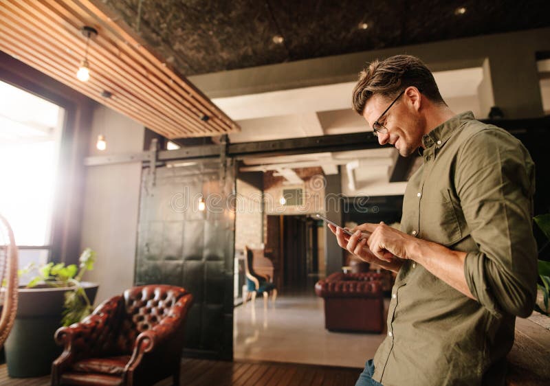 Handsome Young Man Reading Text Message Stock Image - Image of males ...