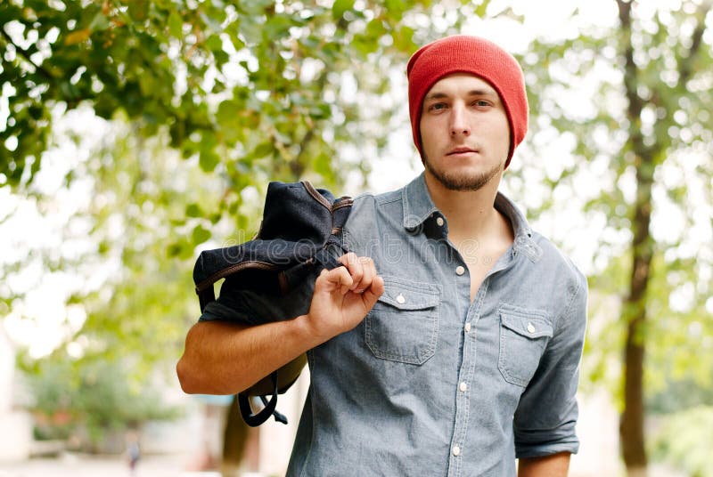 Handsome Young Man in a Red Cap Stock Image - Image of cheerful ...
