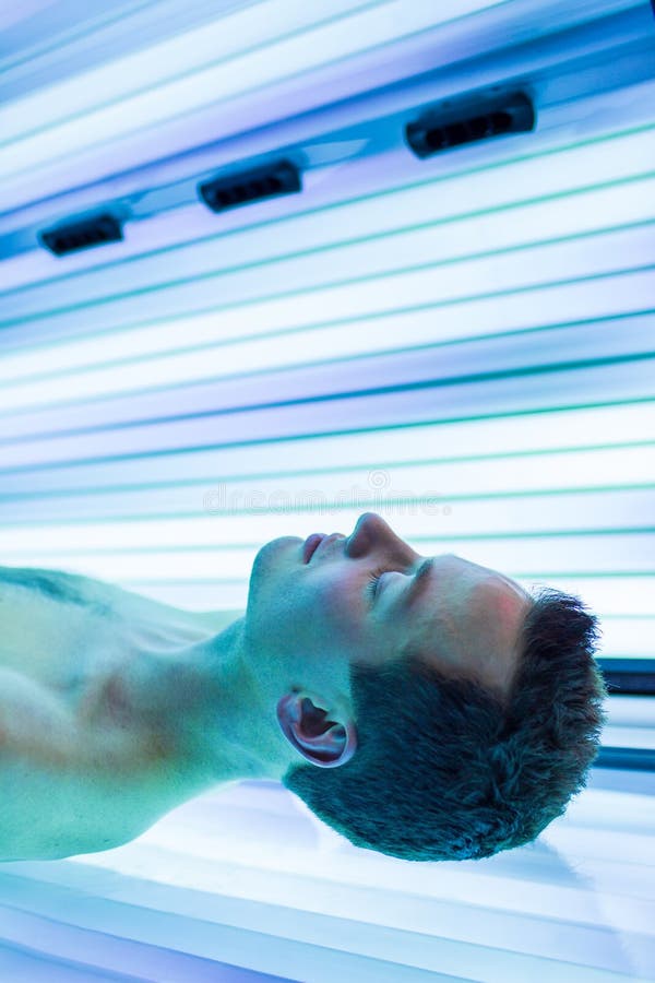 Handsome Young Man Relaxing in a Modern Solarium Stock Image - Image of ...