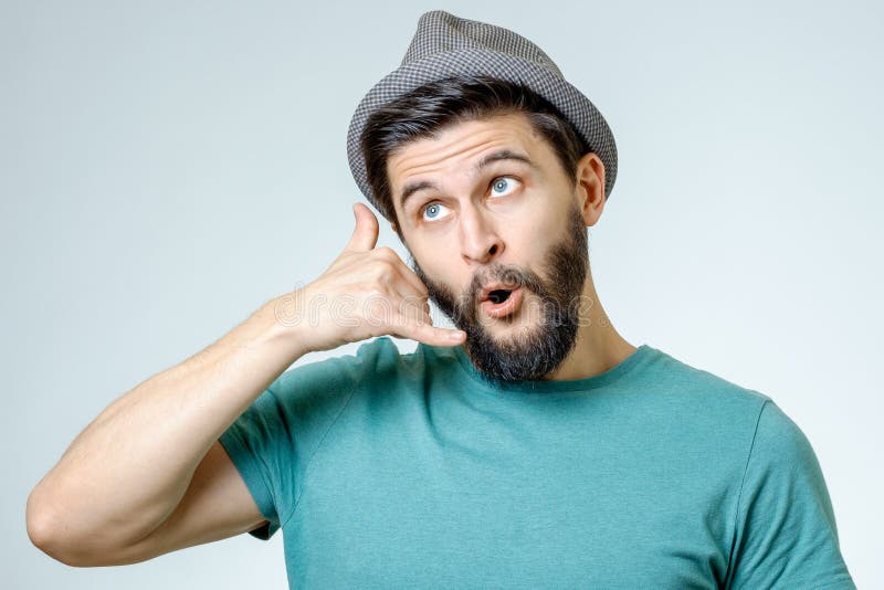 Handsome Young Man Showing a Call Me Sign Stock Photo - Image of model ...