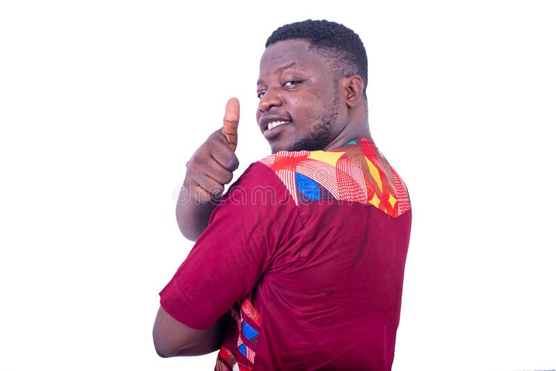 Handsome Young Man Showing His Thumb Over His Shoulder Stock Image ...