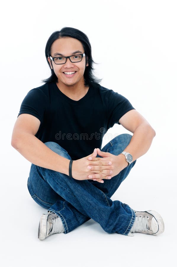 Handsome Young Man Sitting on the Floor Stock Photo - Image of handsome ...