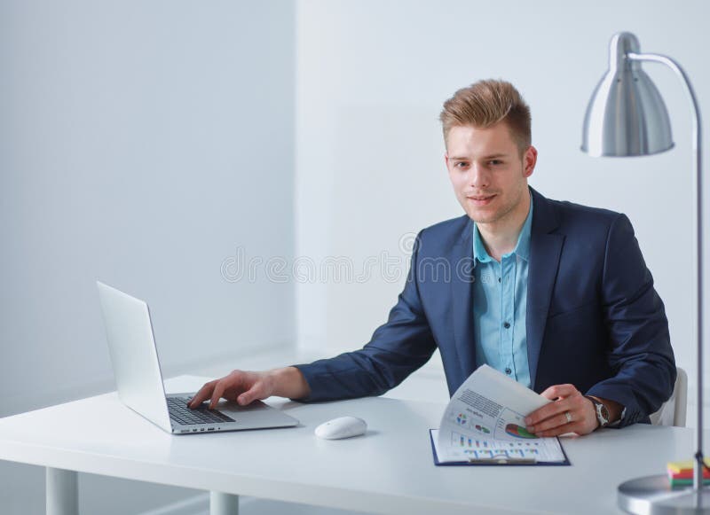 Handsome Young Man Sitting and Working on Laptop Computer Stock Image ...